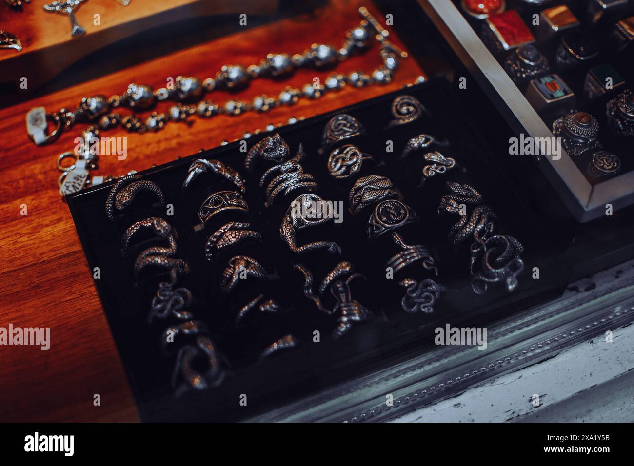 A showcase with silver rings Stock Photo - Alamy