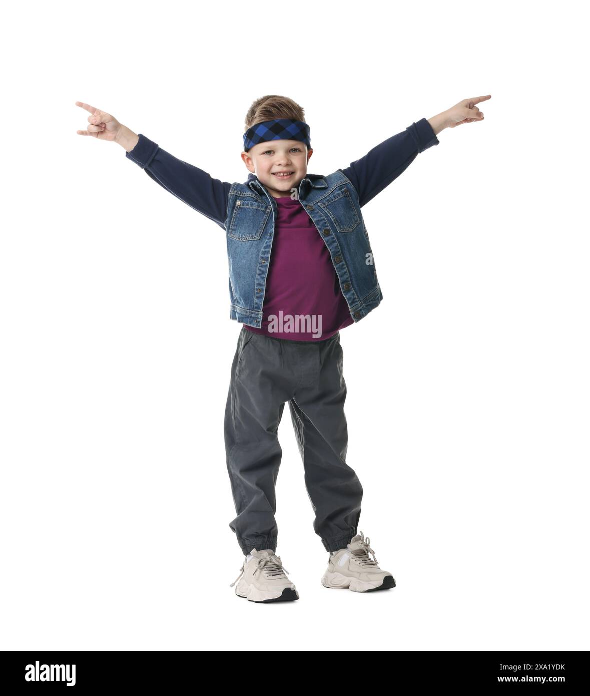 Happy little boy dancing on white background Stock Photo - Alamy