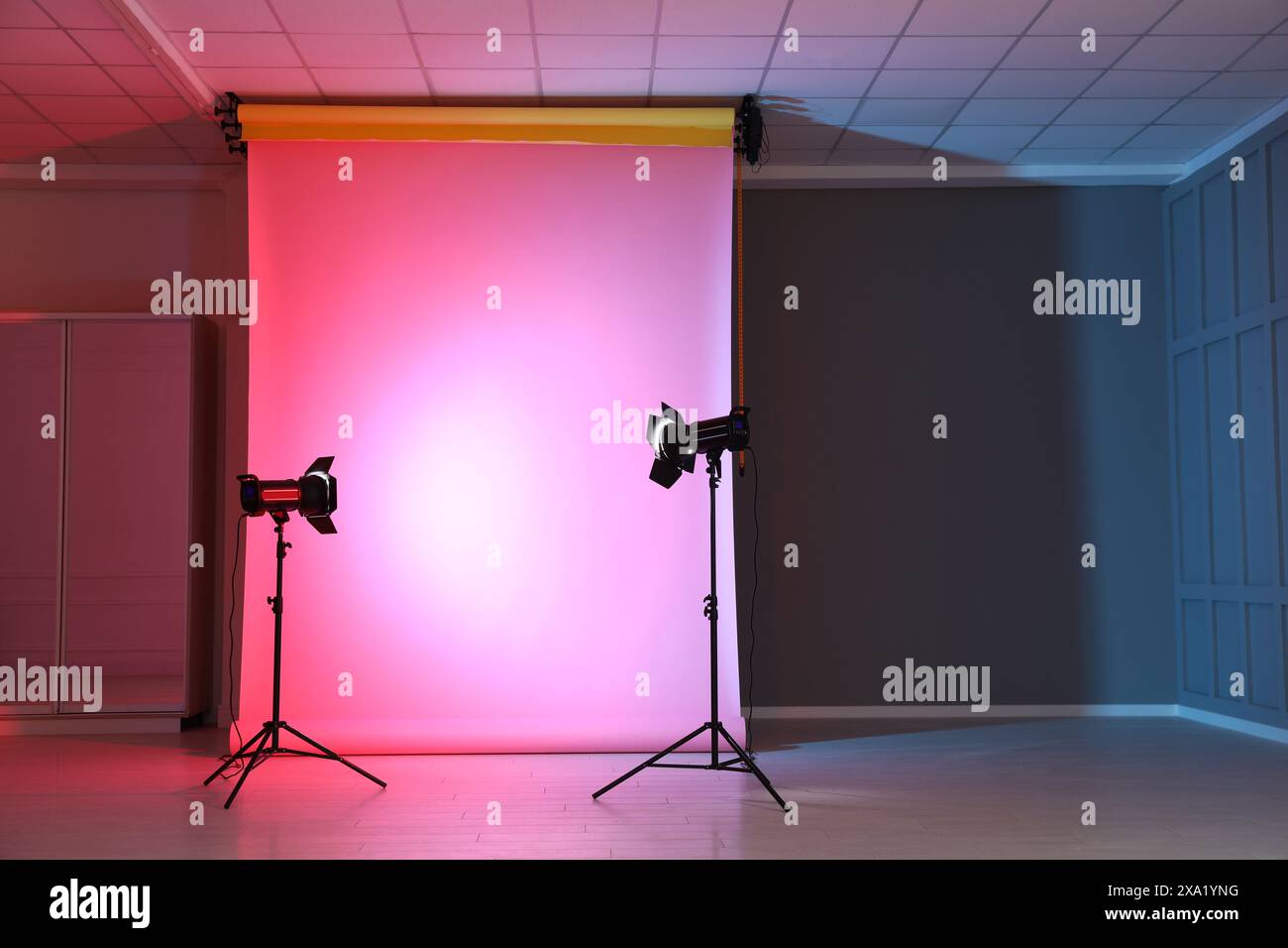 Photo background in neon lights and professional lighting equipment ...