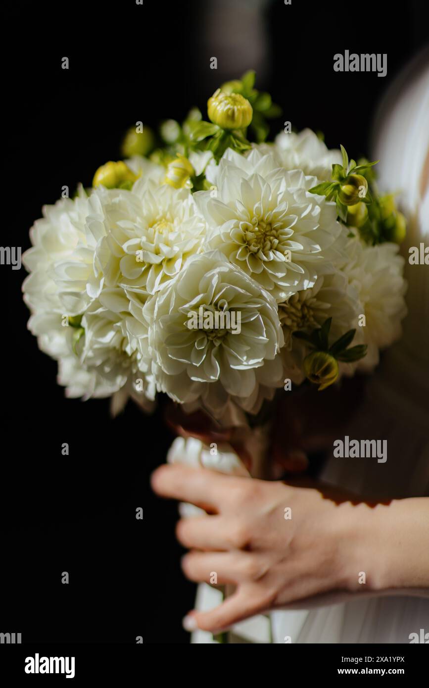 A bride holding her wedding bouquet prepared for the ceremony Stock ...