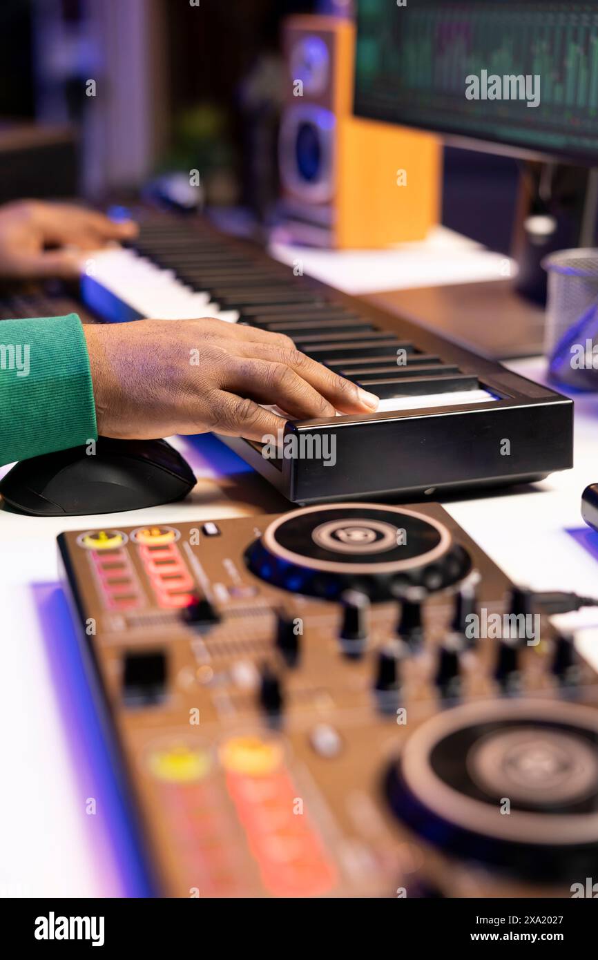 Playing old midi controller keyboard hi-res stock photography and ...