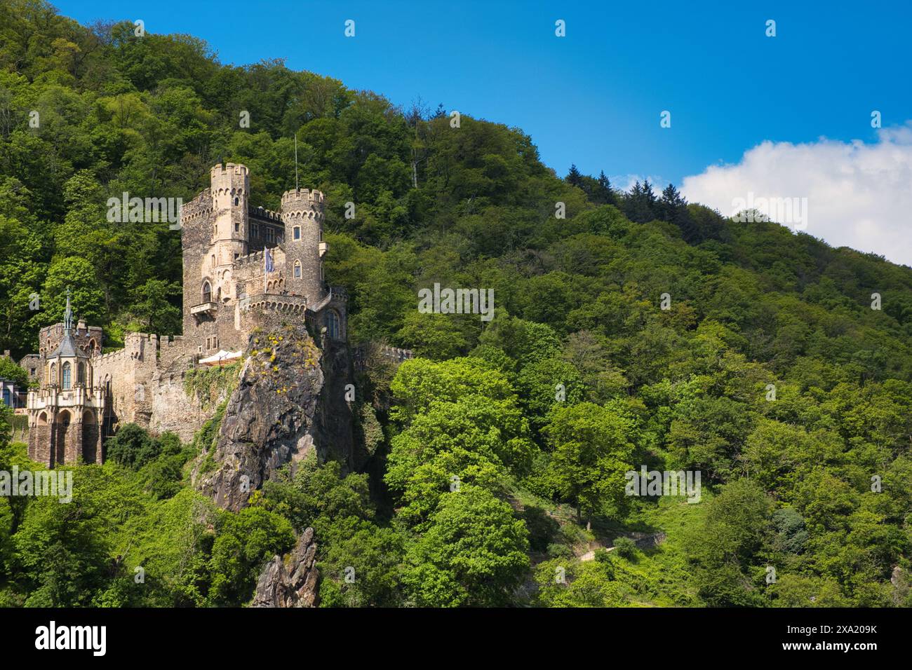 A Medieval castle on mountain cliff Stock Photo - Alamy