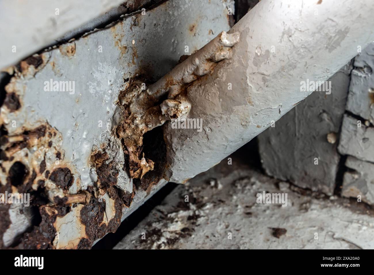 Damaged - corroded steel strut structure, close up Stock Photo - Alamy