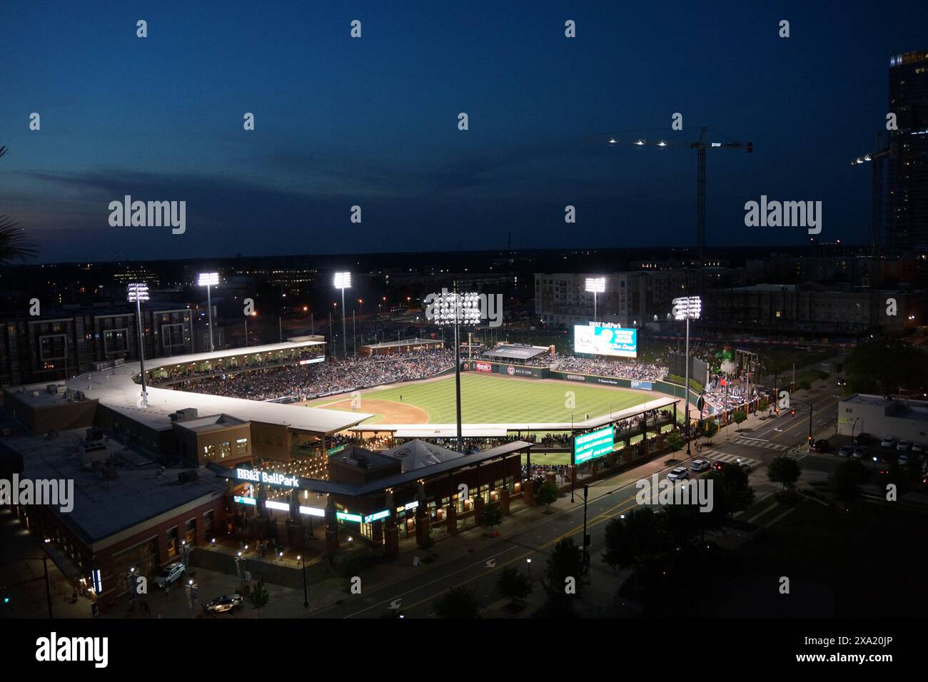 Night baseball game at stadium with crowd Stock Photo - Alamy
