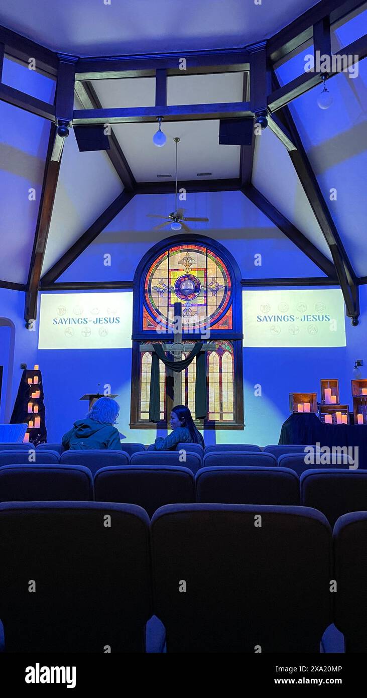 Inside a smaller Christian Church with blue lighting and beautiful ...