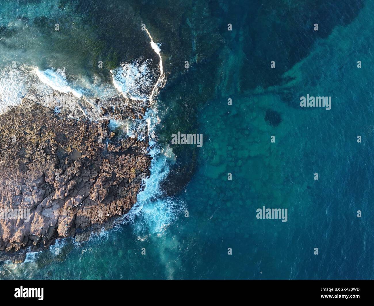 A breathtaking aerial view of a reef break in Shellharbour Stock Photo ...