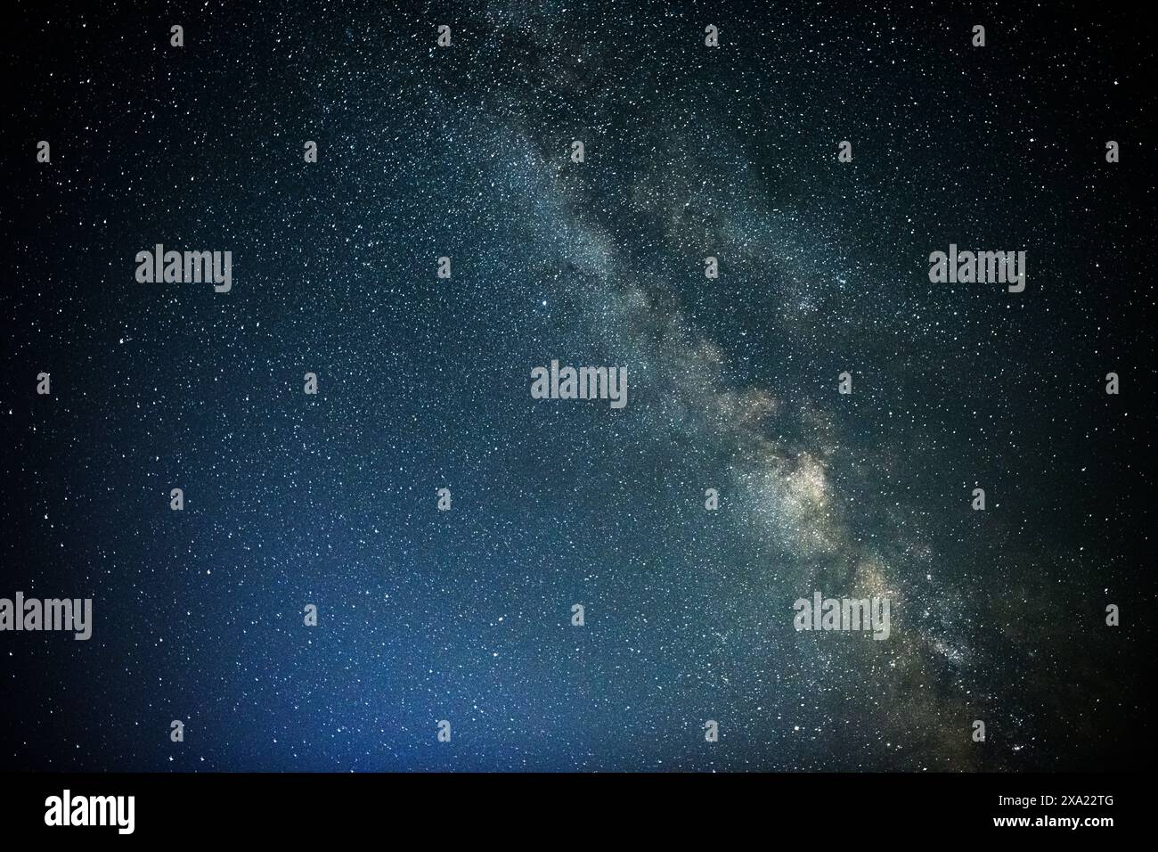 A scenic view of the Milky Way galaxy in a starry night sky Stock Photo ...