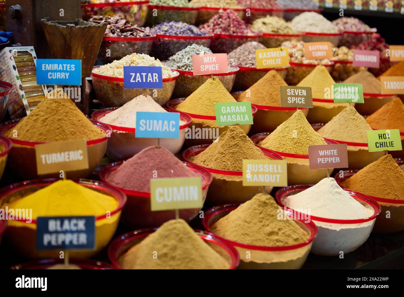 Assorted spices in baskets for sale on display Stock Photo - Alamy