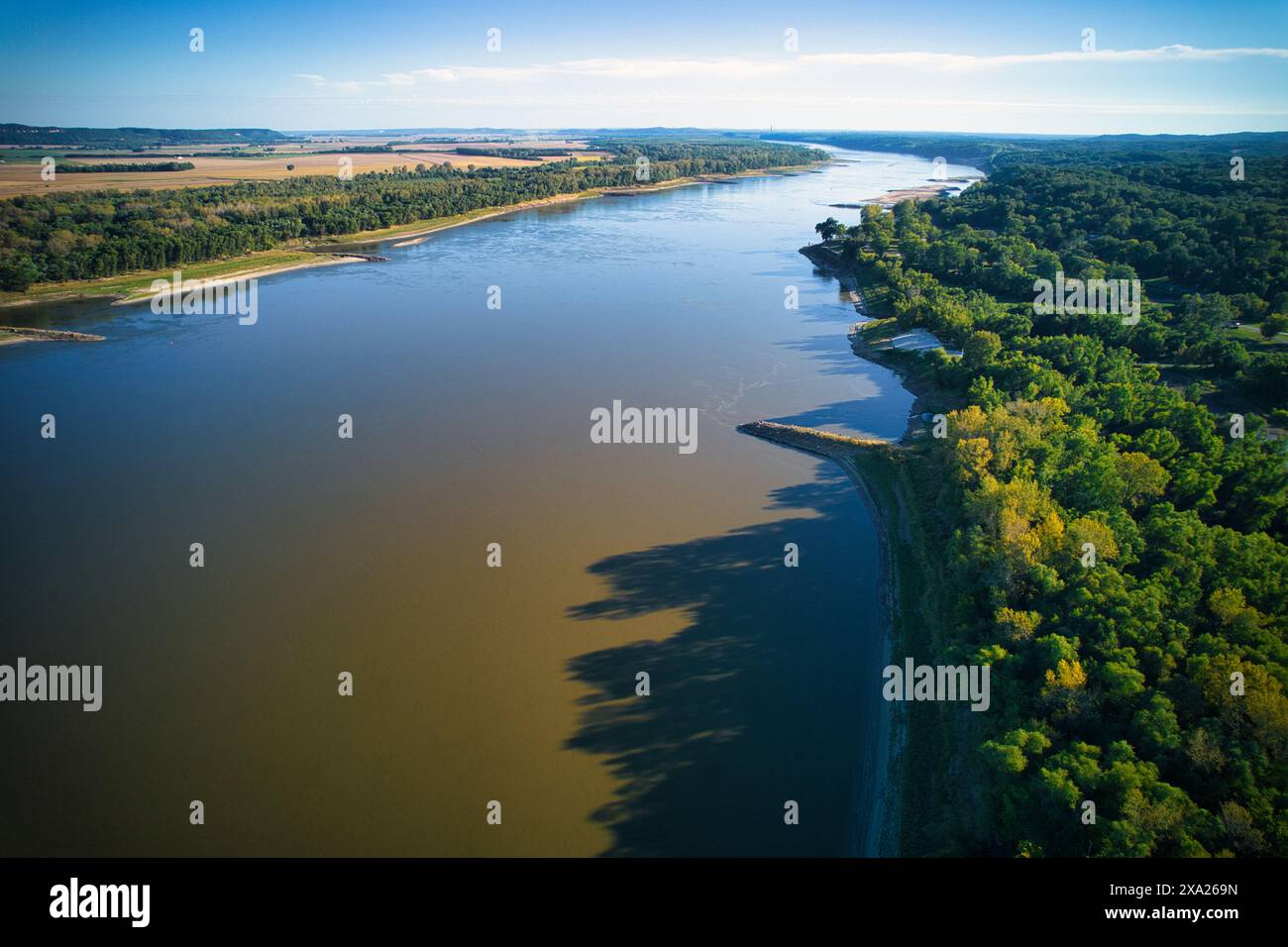 A serene and endless flow of still water from the shore Stock Photo - Alamy
