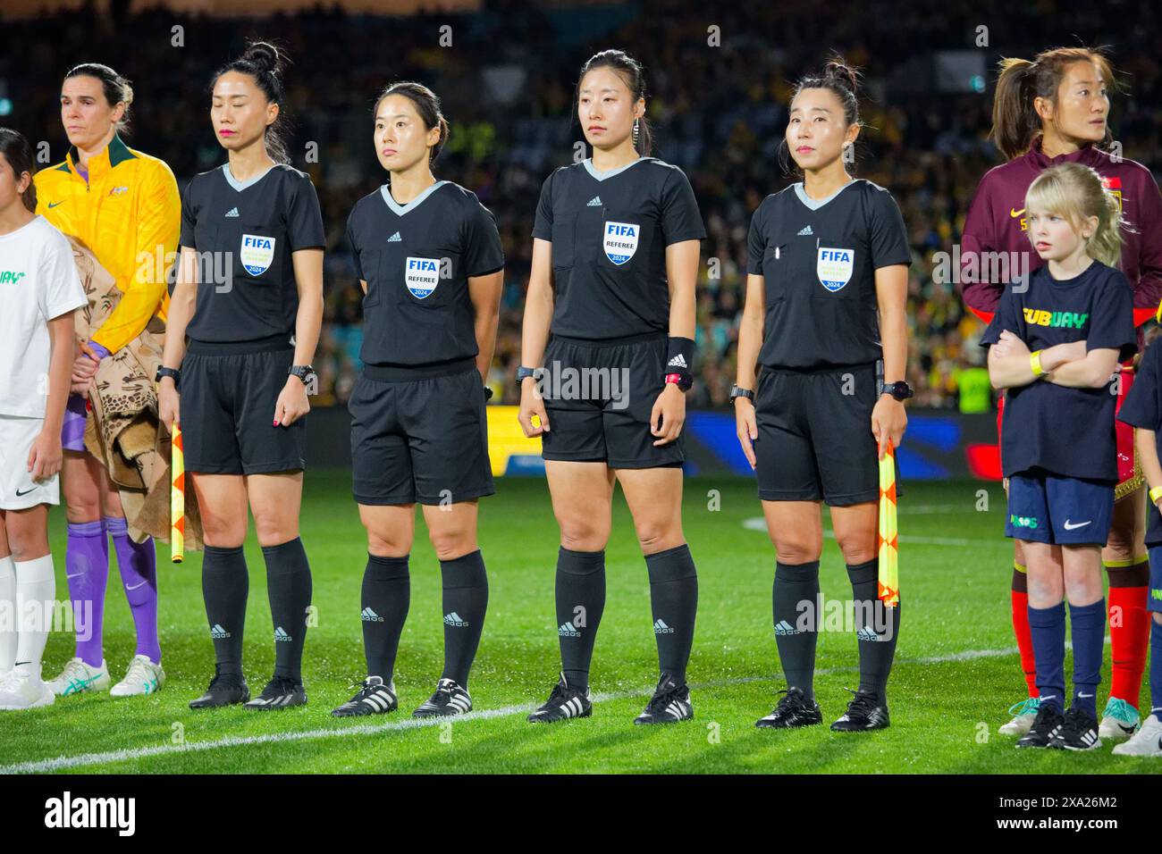 Match Referees lineup on the pitch for the National Anthem before the ...