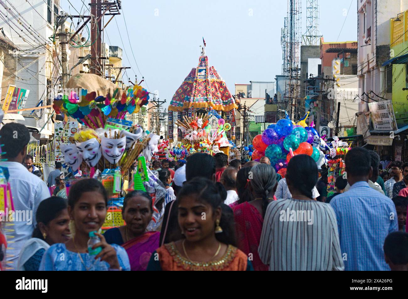 People, Devotees, Street Vendors with colourful street merchandise ...