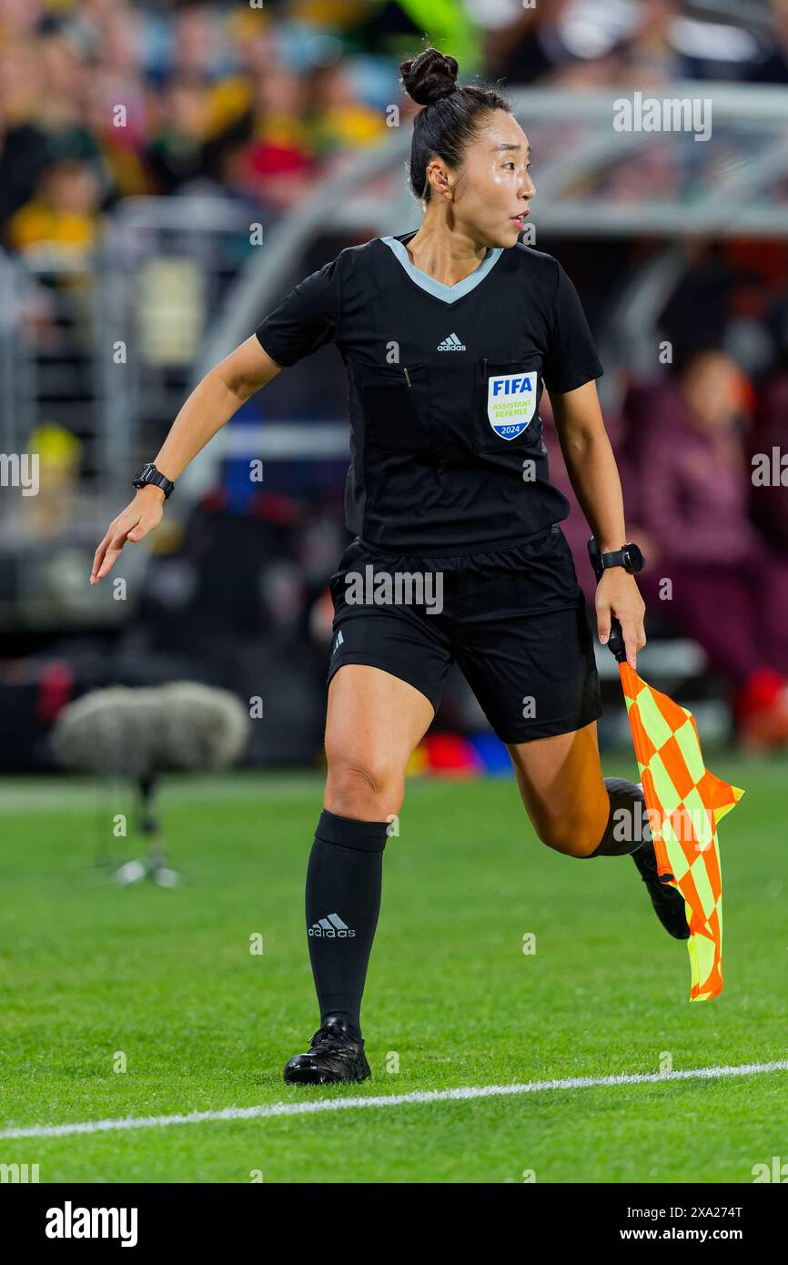 Assistant referee, Park Misuk in action during the international ...