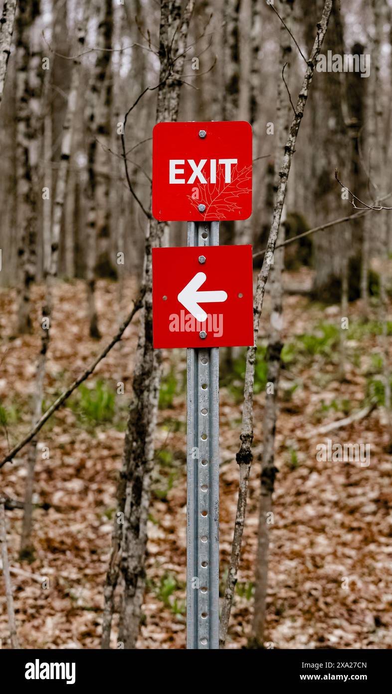 A red exit sign on a trail indicating the correct exit route Stock ...