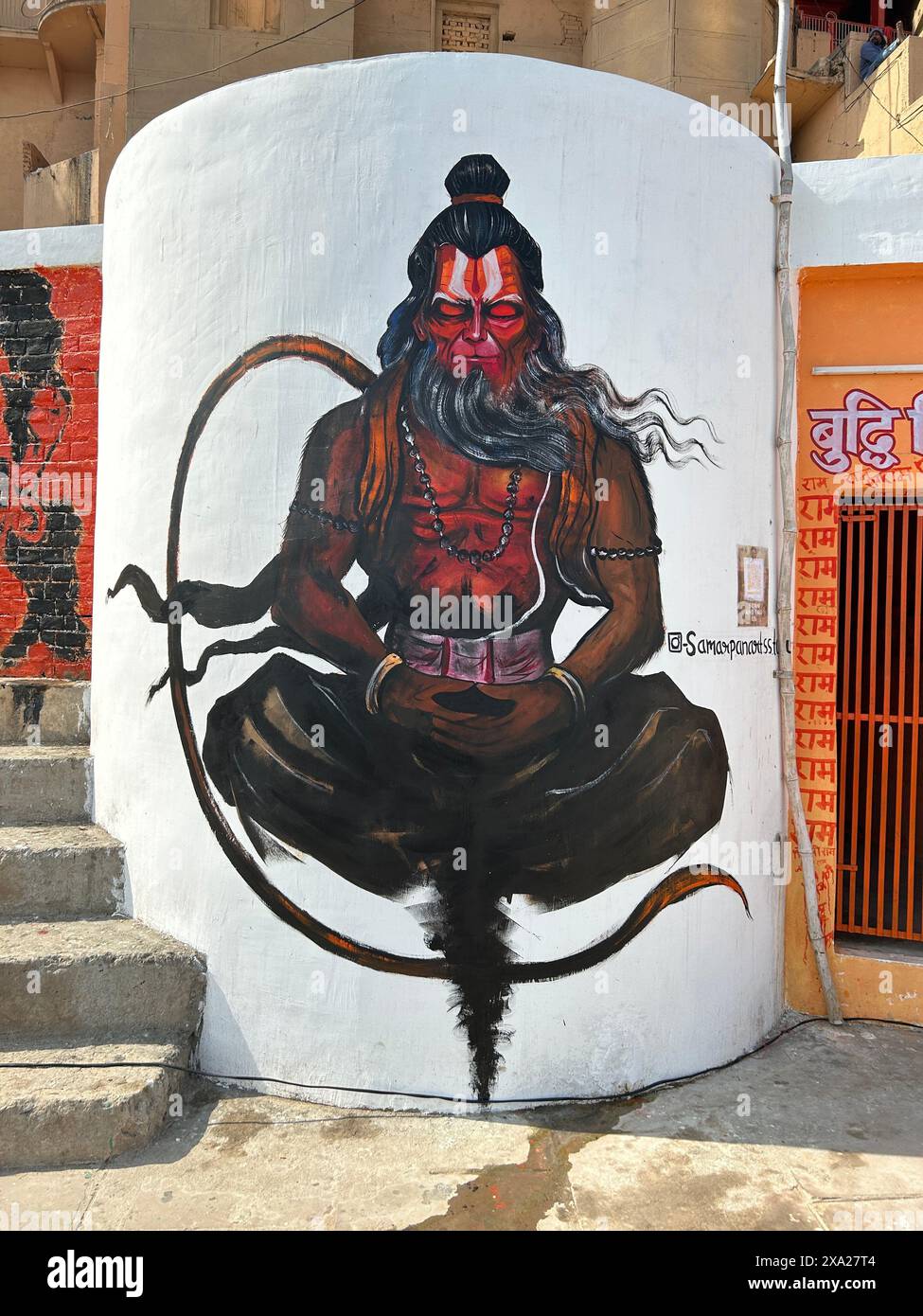 A wall mural depicting a man in devil and demon costume Stock Photo - Alamy