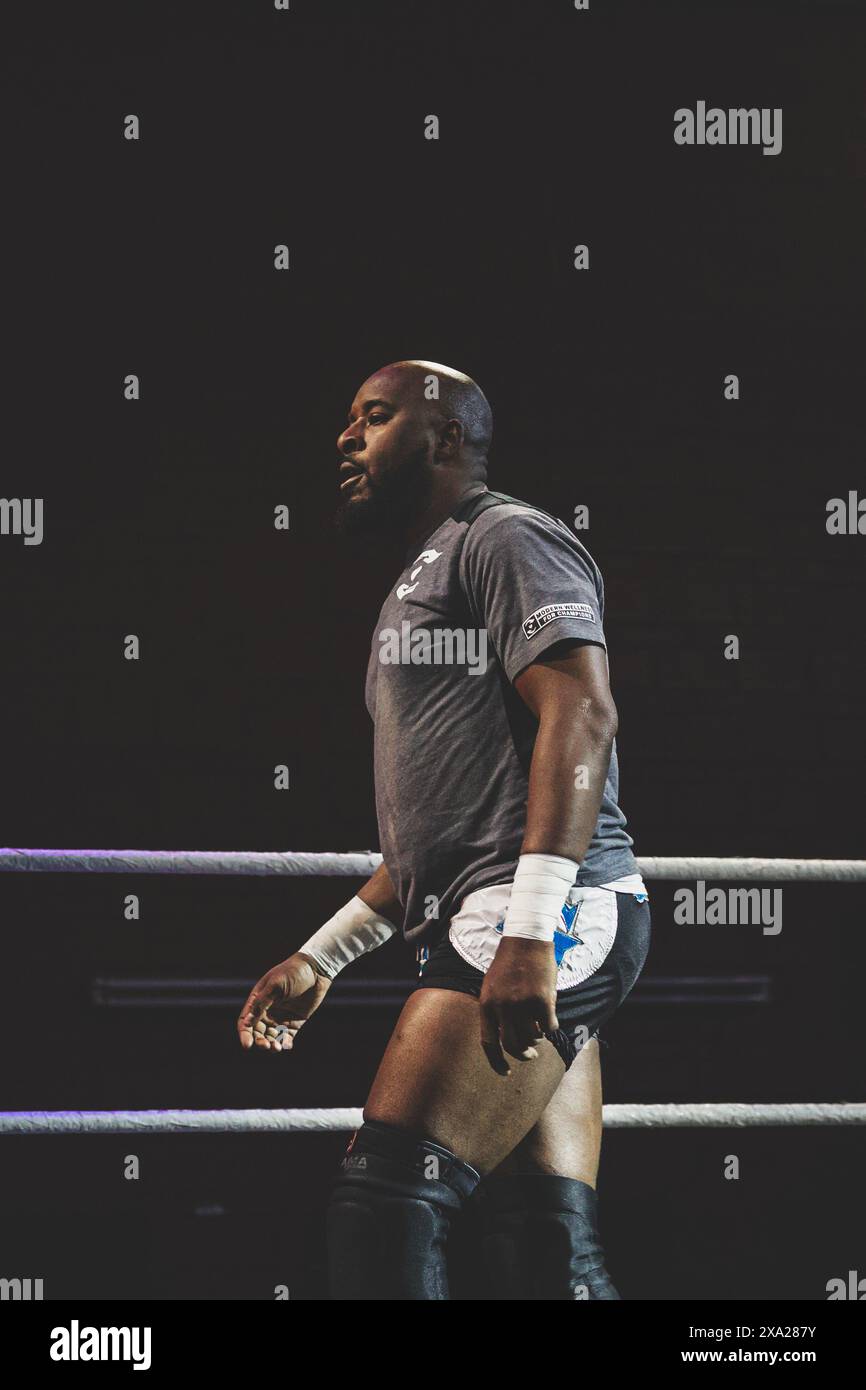 A pro wrestler in the ring before the start of the match waiting for ...