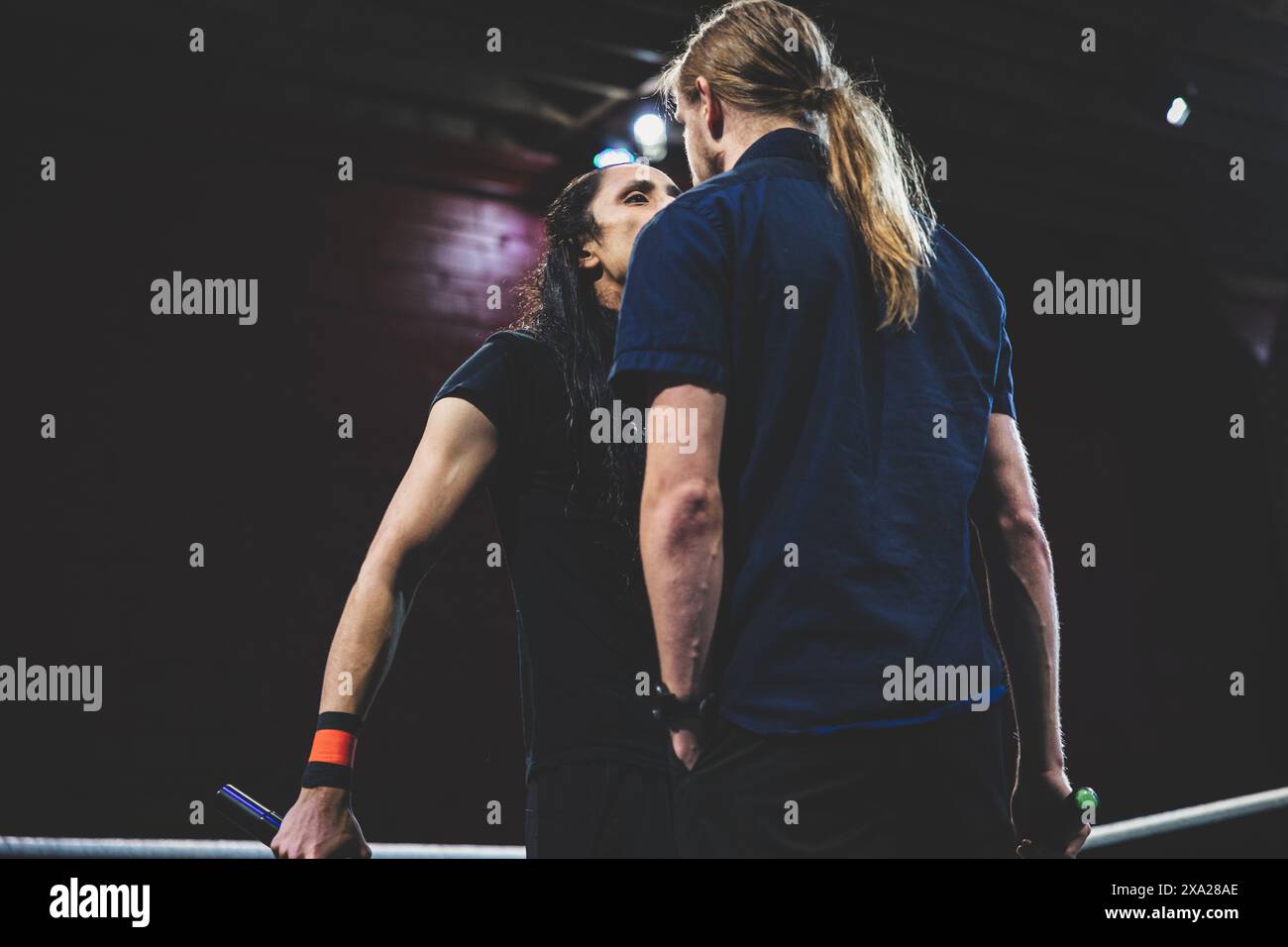 2 men in the cent chest bumping in a physical altercation before the ...