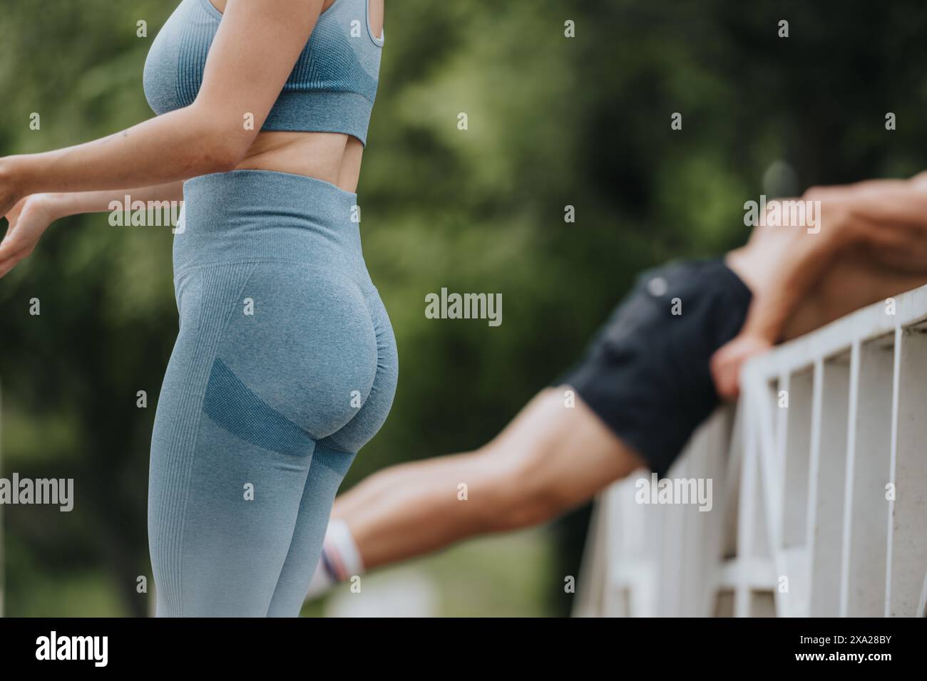 Outdoor workout with two people exercising in nature Stock Photo - Alamy