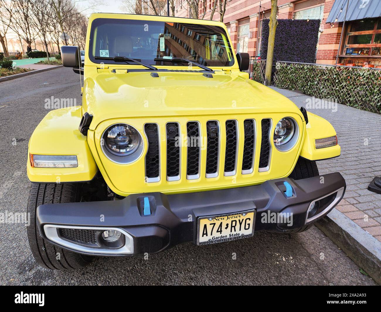 New York City, USA - March 17, 2024: Jeep Wrangler Unlimited yellow ...