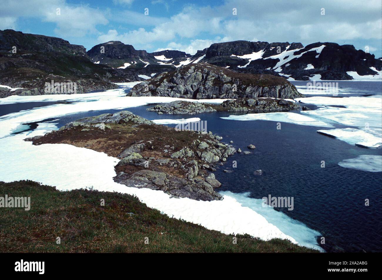View across ice-covered inlet, taken in 1993, Strandal, Hjørundfjord ...
