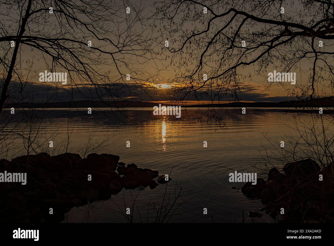 The Sunset over Lake Vasman in Ludvika County, Sweden and the colorful ...