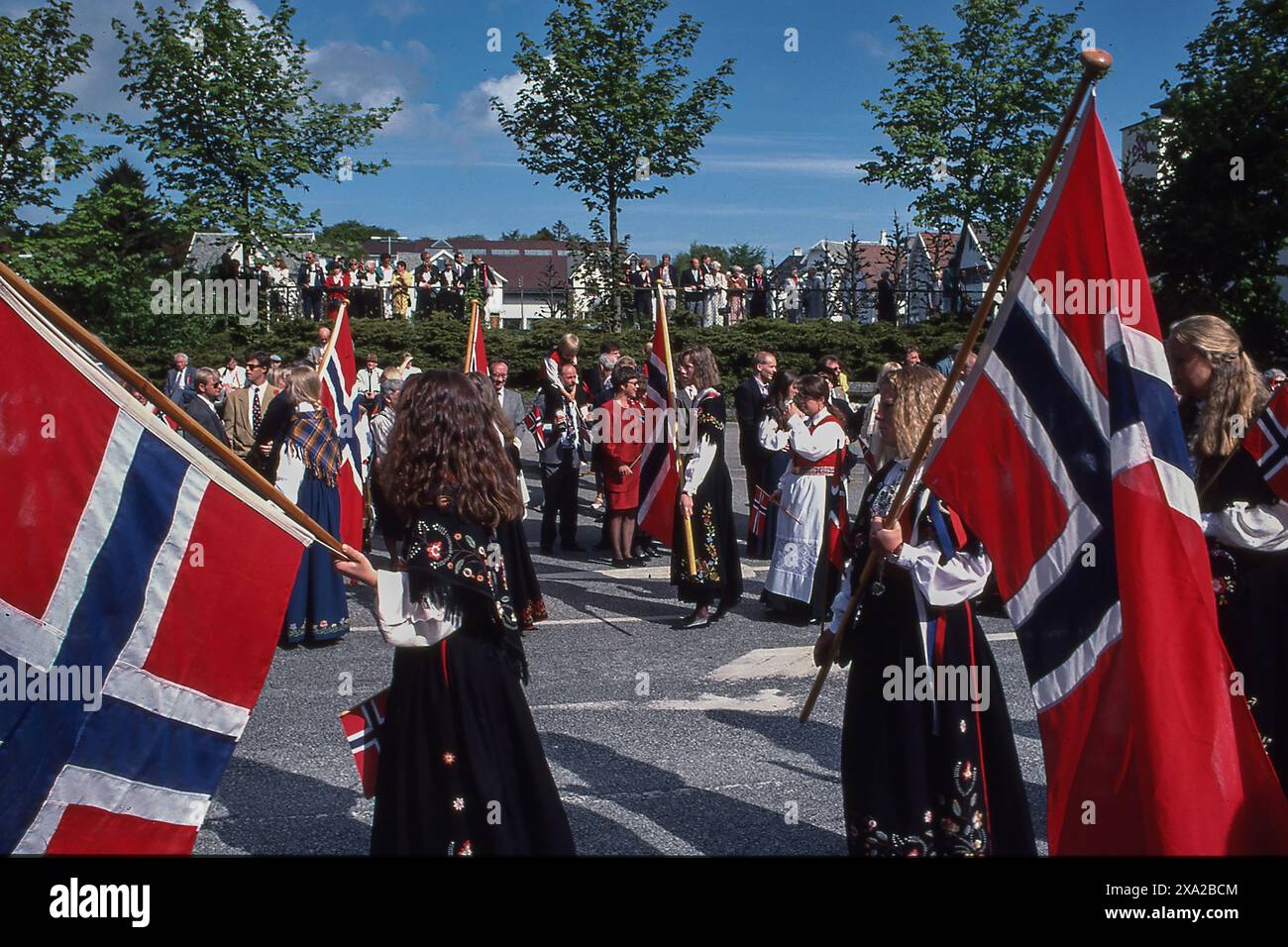 Women in national dress carrying flags, 17th May National Day Parade ...