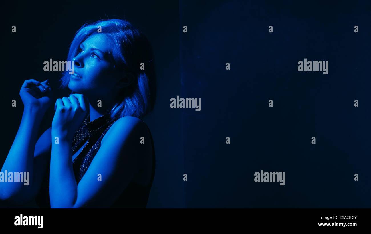 Hoping woman. Depression overcome. Female raising hands looking up ...