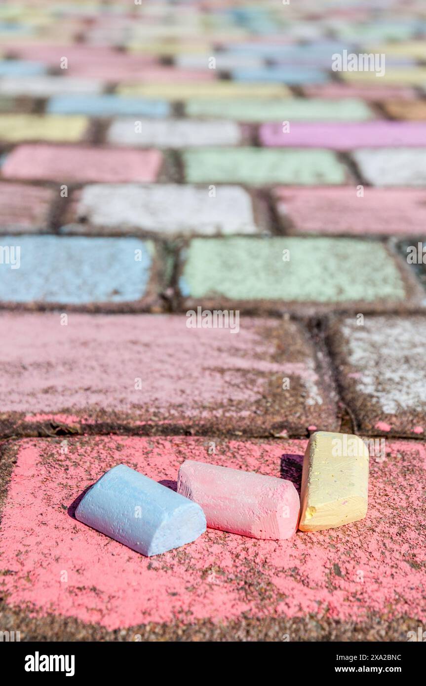 The paving stones painted with colorful street chalk Stock Photo - Alamy