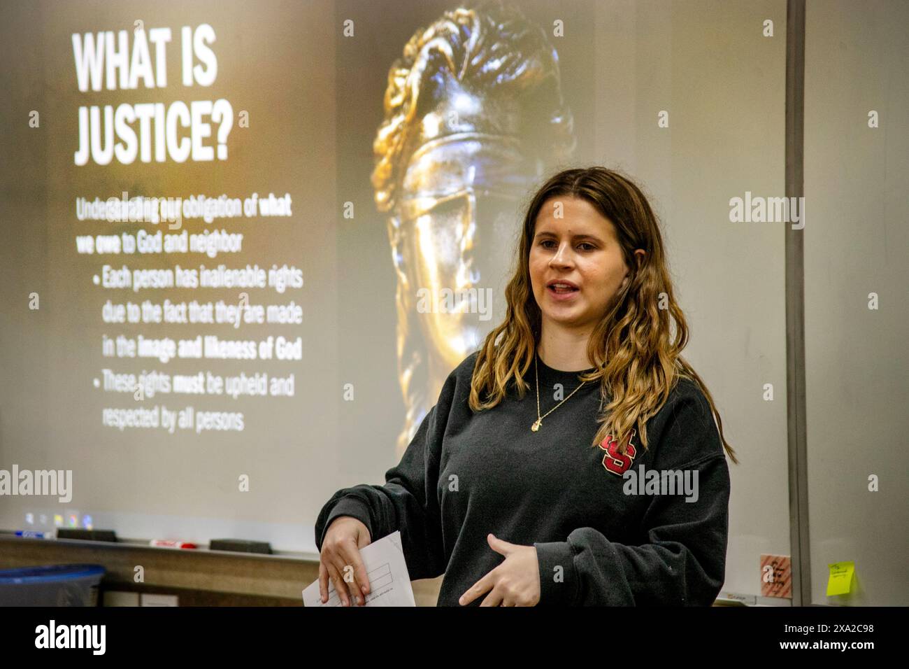 A Southern California high school teacher lectures her class on the ...