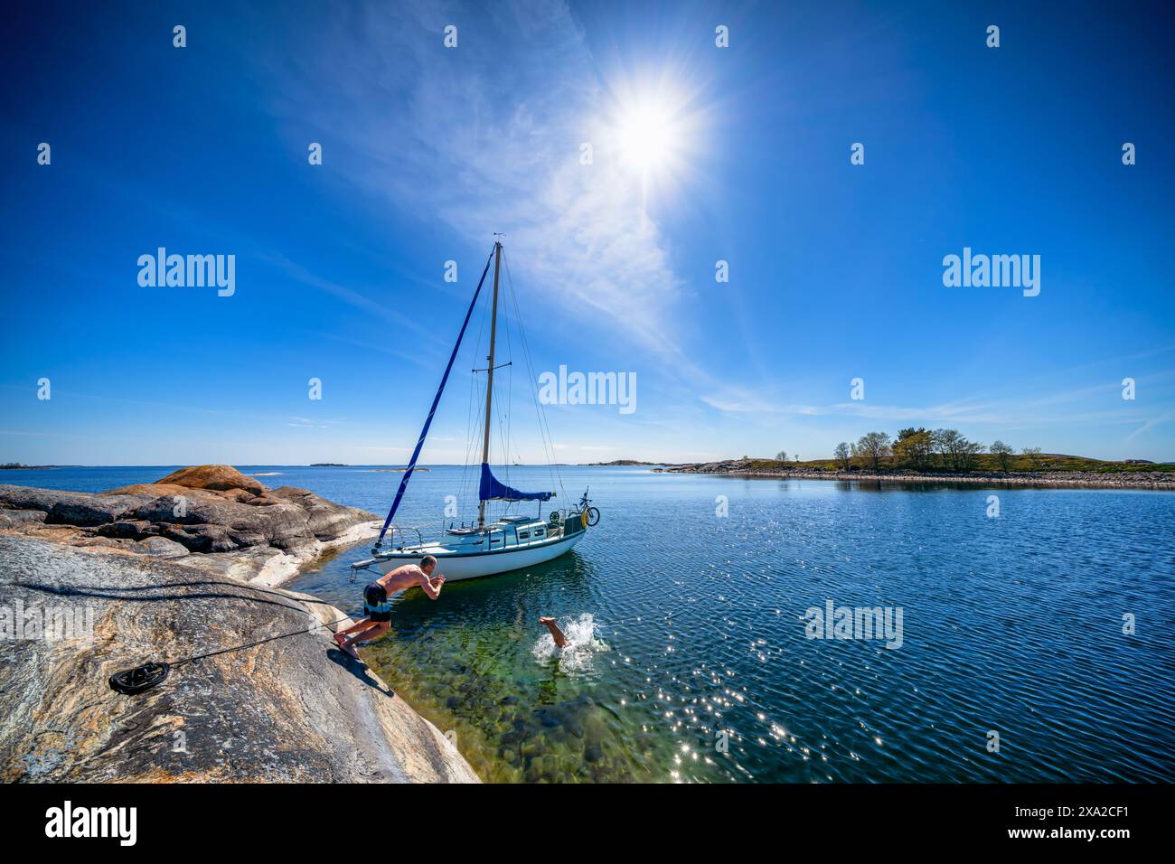 Taking a dive at Kråkskär island, Parainen, Finland Stock Photo - Alamy