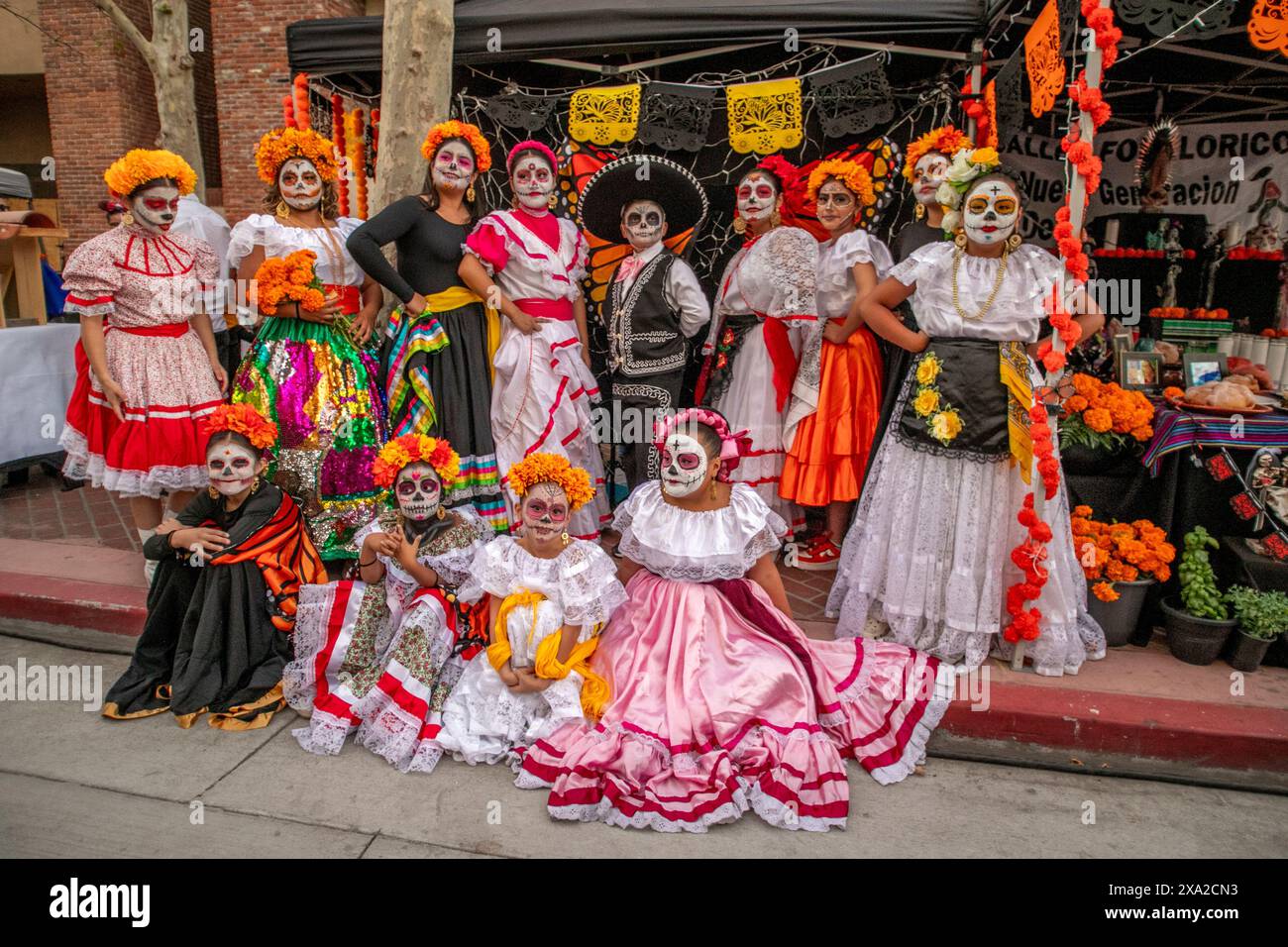 At a Day of the Dead festival in Santa Ana, CA, Mexican American adults ...