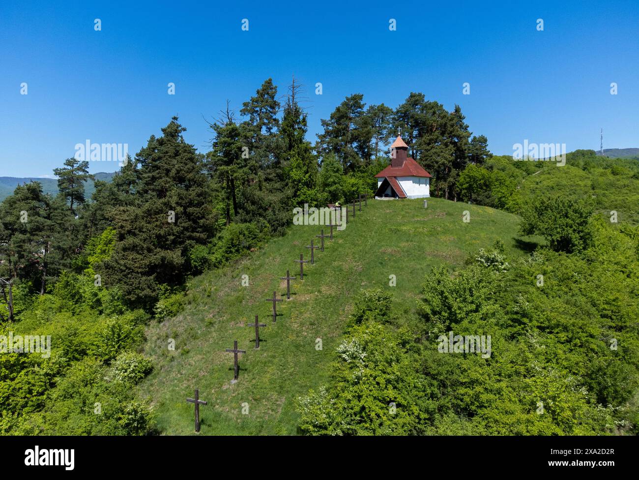 An aerial view of a Catholic chapel with 14 crosses in Sovata, Romania ...
