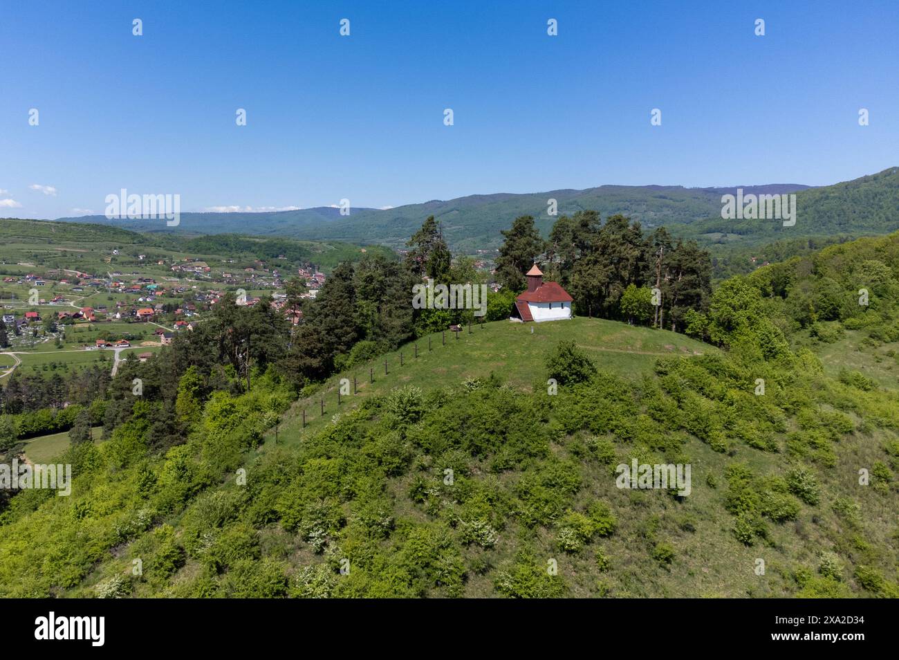 An aerial view of a Catholic chapel with 14 crosses in Sovata, Romania ...