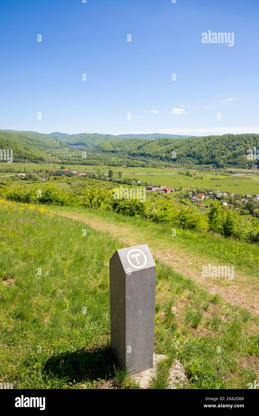 A tourist sign for Via Transilvanica trail in Romania's Transylvania ...