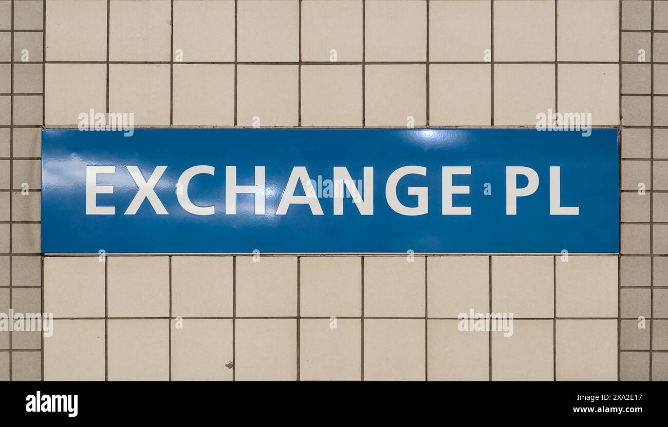 exchange place sign on wall of metro train station platform in new ...