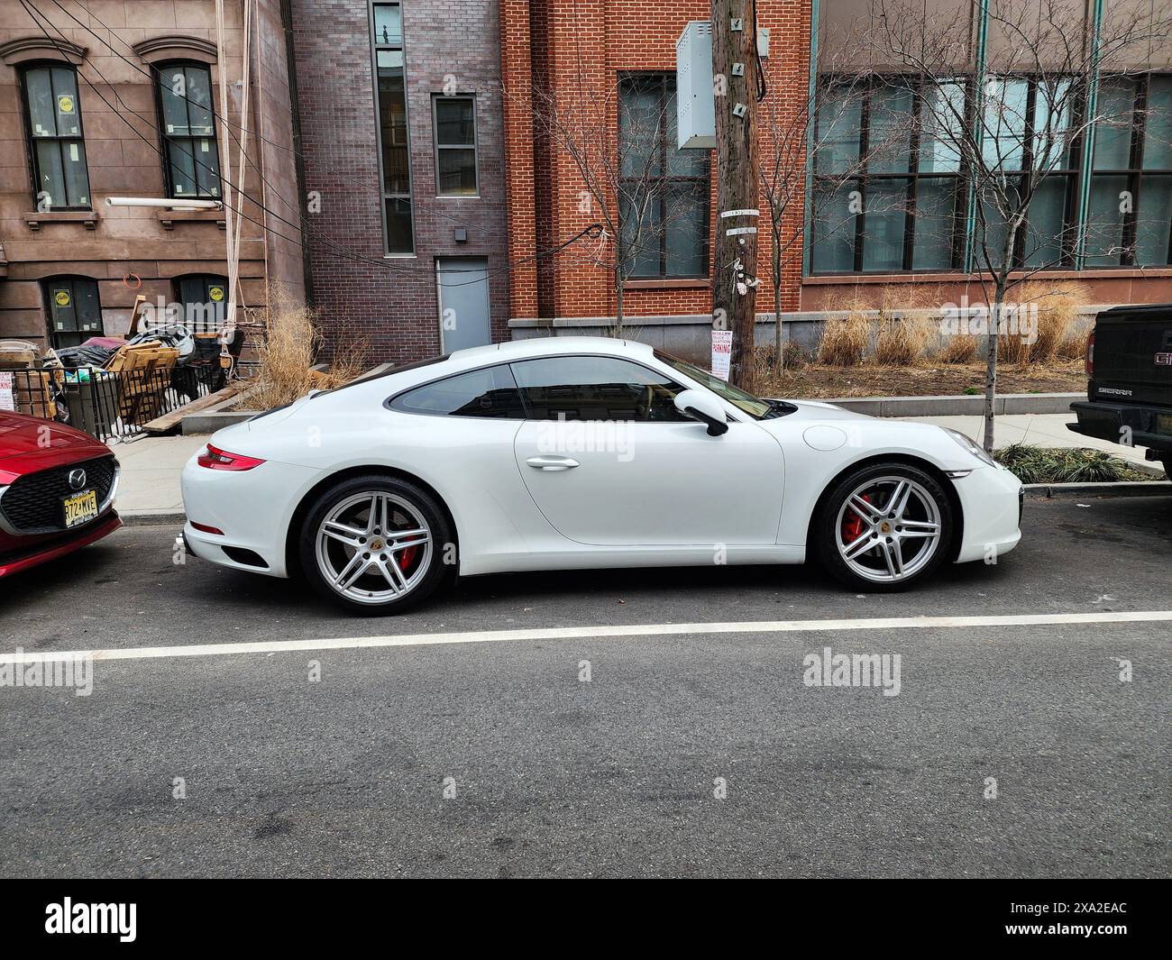 New York City, USA - February 10, 2024: Porsche 911 white car parker ...