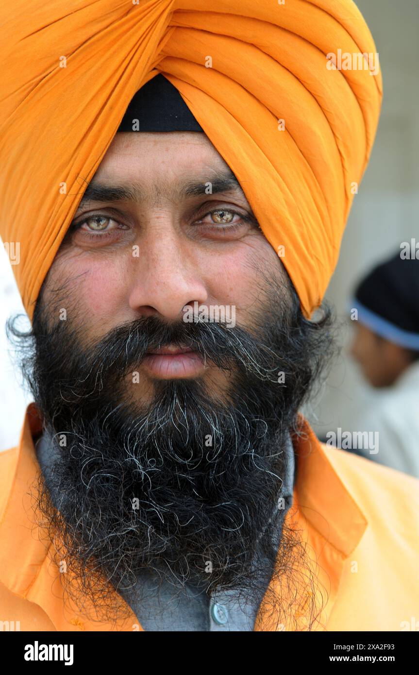 Portrait of a beautiful Sikh man taken at the entrance of the Golden ...