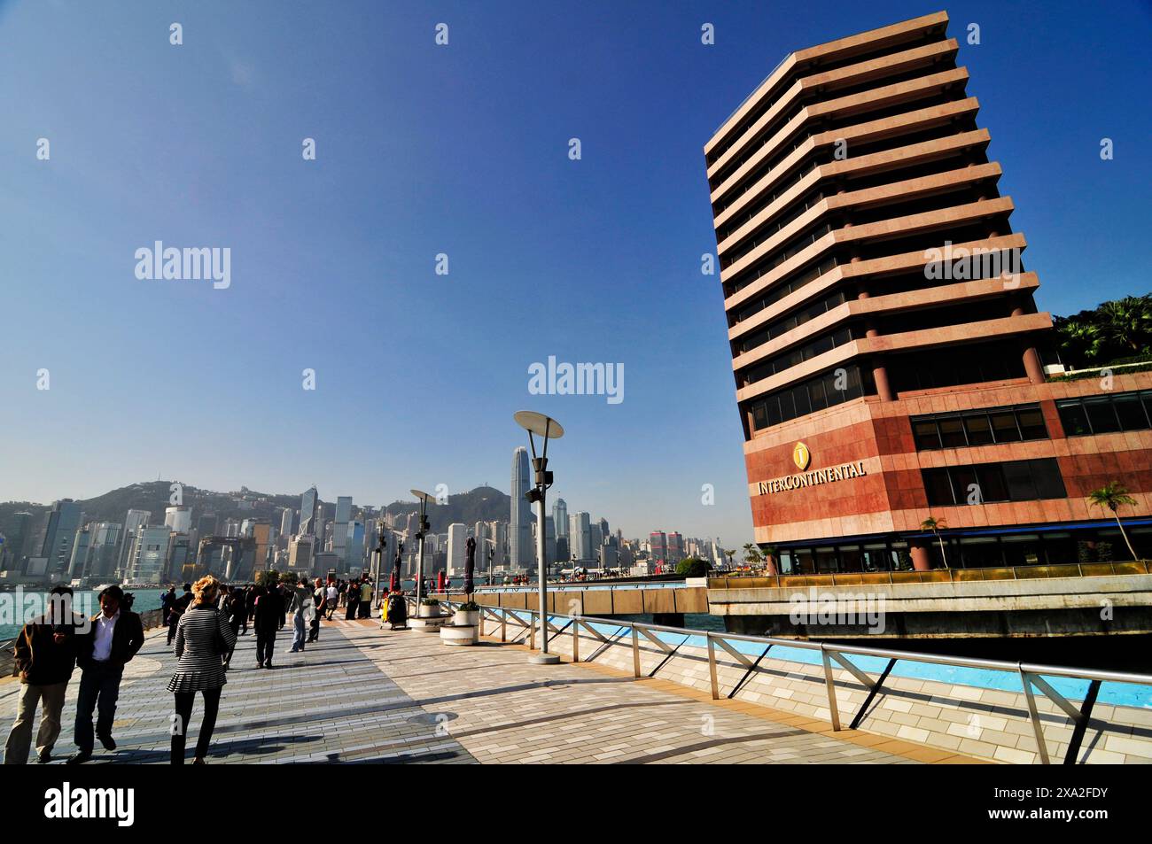 The Intercontinental hotel by theVictoria harbour promenade in Tsim Sha Tsui, Kowloon, Hong Kong ...