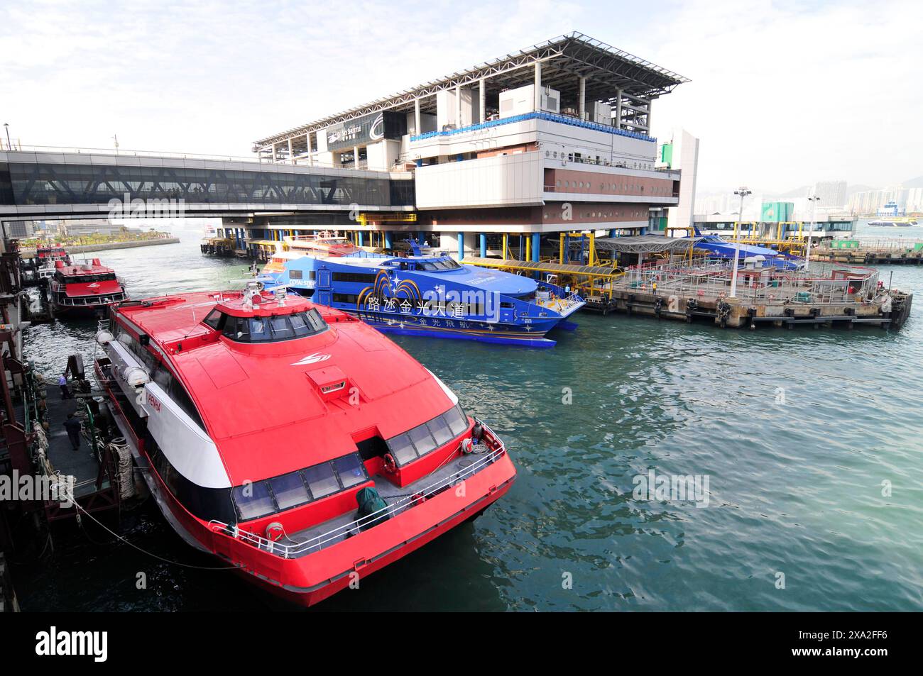 Turbojet ferries to Macau docking at the Macau ferry terminal in Sheung ...