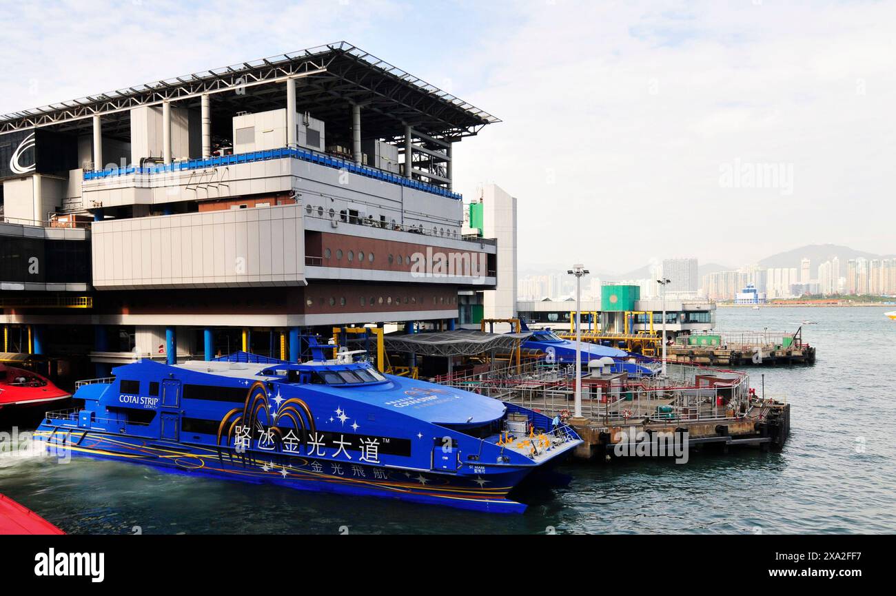 Turbojet ferries to Macau docking at the Macau ferry terminal in Sheung ...