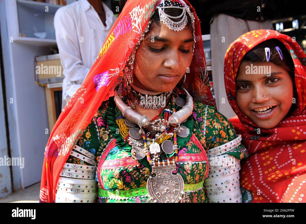 Colorful Rajasthani women visit a local market village in the Indian ...