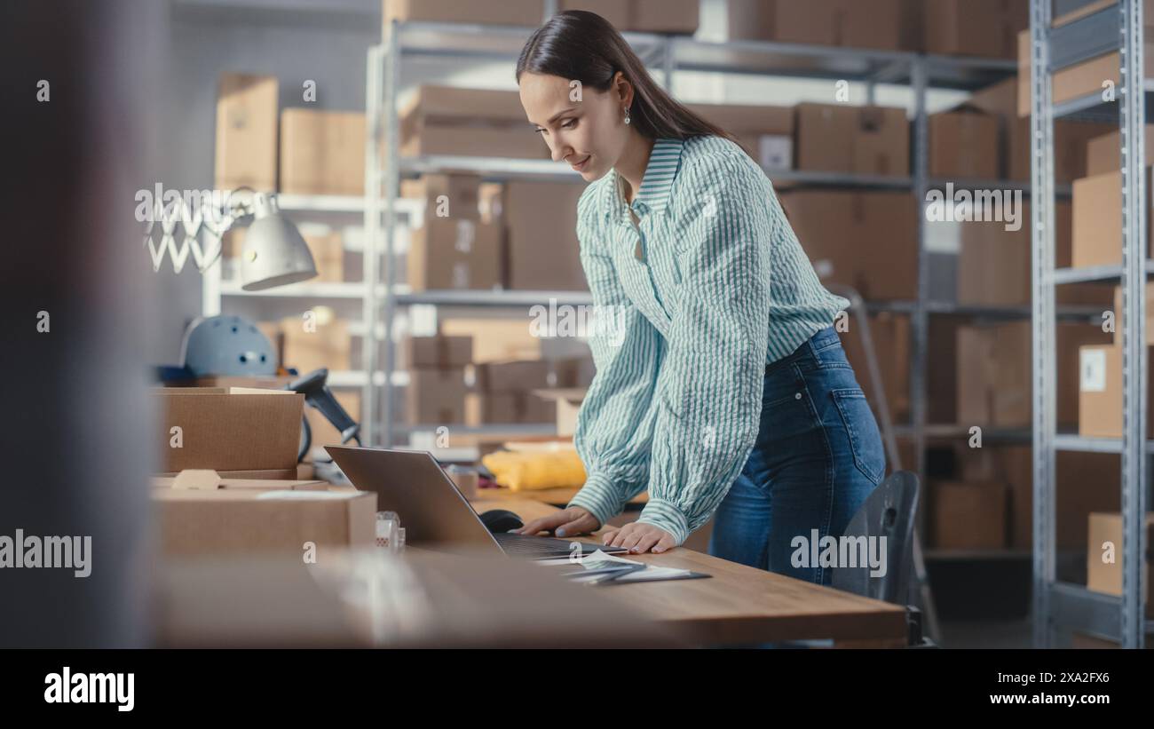 Woman desk parcels laptop hi-res stock photography and images - Alamy