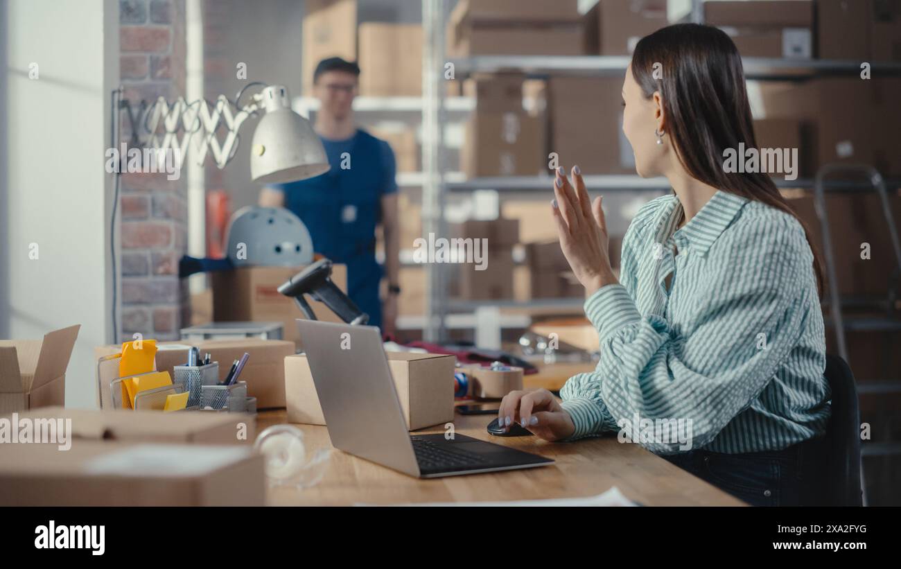 Warehouse Inventory Manager Using Laptop Computer, Preparing a Small ...