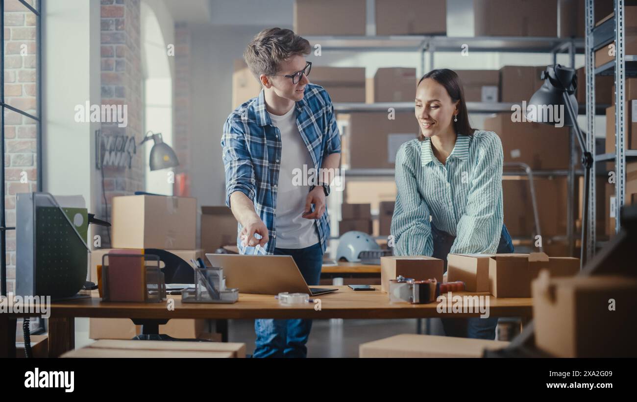 Two Successful Small Business Owners Working in Warehouse. Talking ...