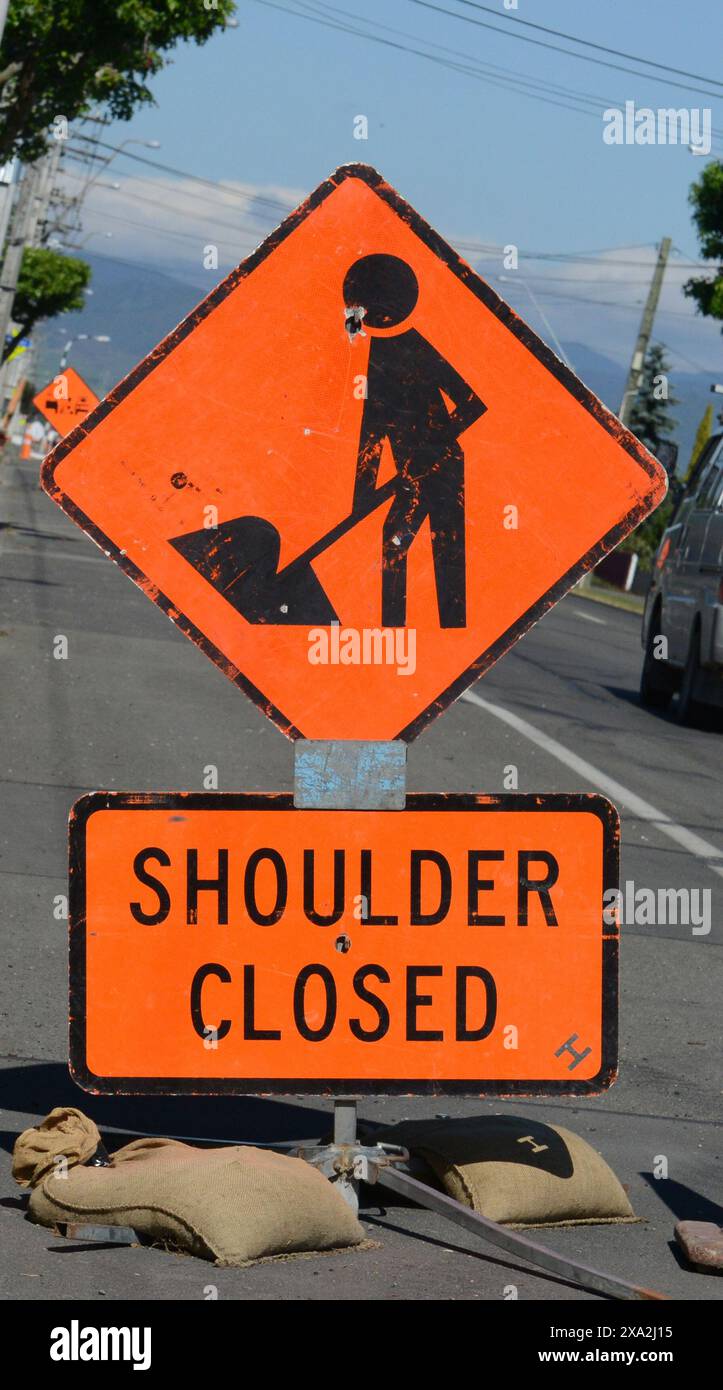 Shoulder work sign hi-res stock photography and images - Alamy