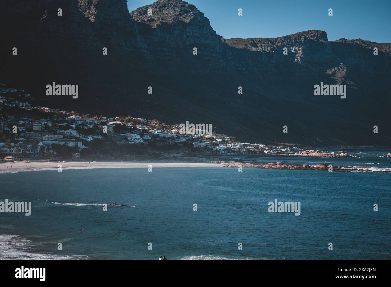 Marvel at the breathtaking view of Camps Bay Beach in Cape Town, South ...