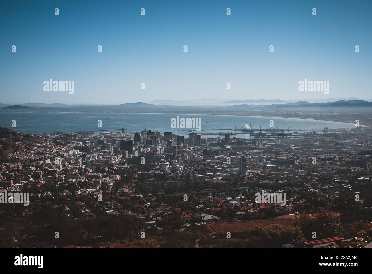 Aerial view of Cape Town's stunning cityscape and coastal line, showcasing the vibrant urban ...