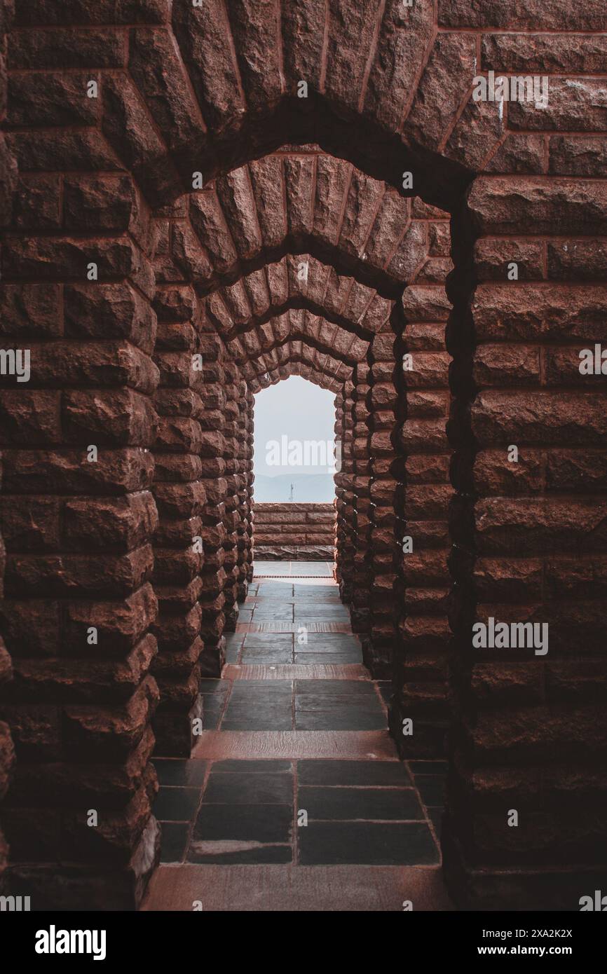 A captivating view of a stone arch passageway in South Africa ...