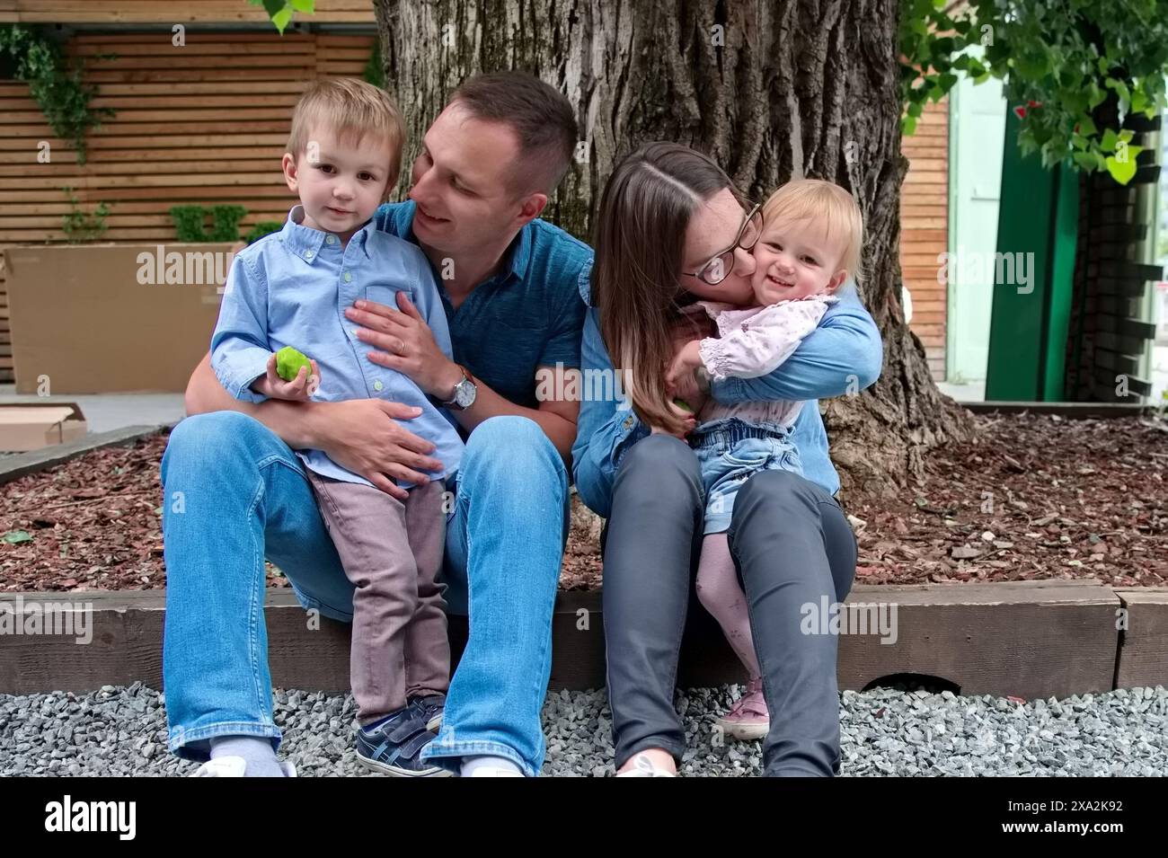 Happy children affection family hi-res stock photography and images - Alamy