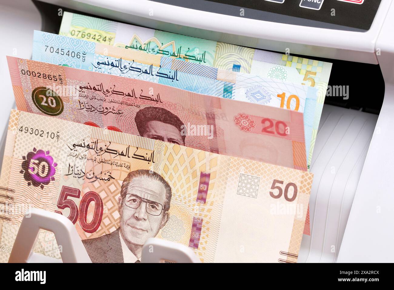 Tunisian money - dinar in a counting machine Stock Photo - Alamy