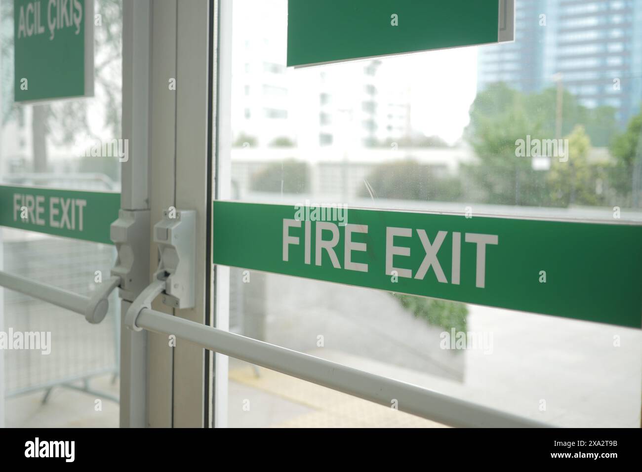 fire exit sign on a door Stock Photo - Alamy